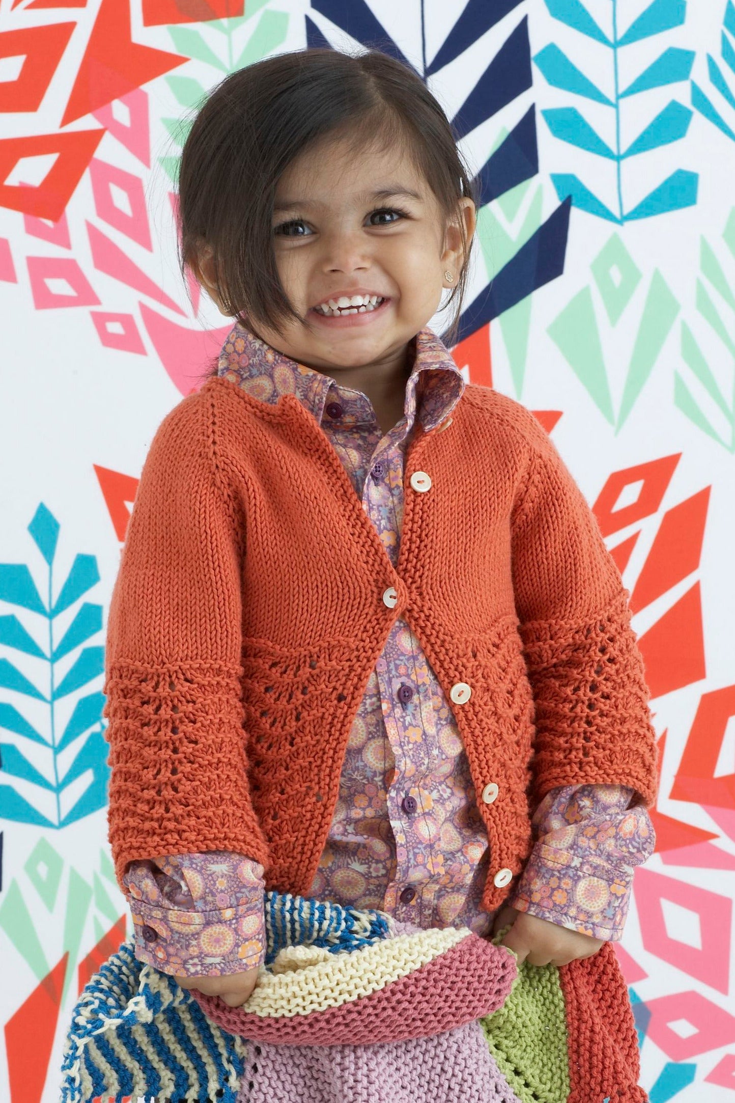 Feather And Fan Baby Sweater Pattern (Knit) – Lion Brand Yarn